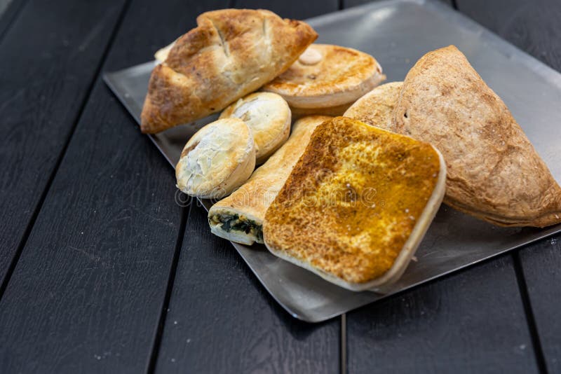 Pies and Puffs on a Silver Plate Stock Photo - Image of currant ...