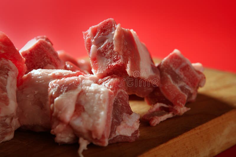 Pig, Pork Raw Meat Pieces Over Red Stock Image - Image of blood, loin ...