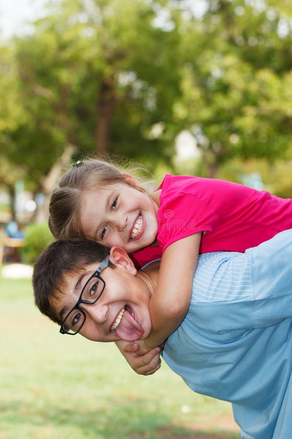 Piggy Back Ride stock image. Image of park, people, piggyback - 33477035
