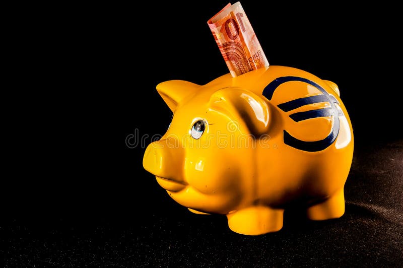 A Piggy Bank with a Coin Inside of it Stock Photo - Image of currency ...