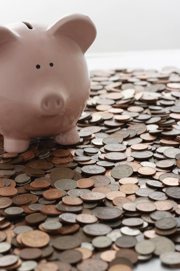 Piggy Bank and Vast Amount of Coins Stock Image - Image of large ...