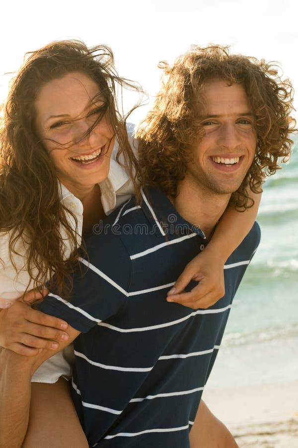 Piggyback ride stock image. Image of middle, beauty, seashore - 10616377