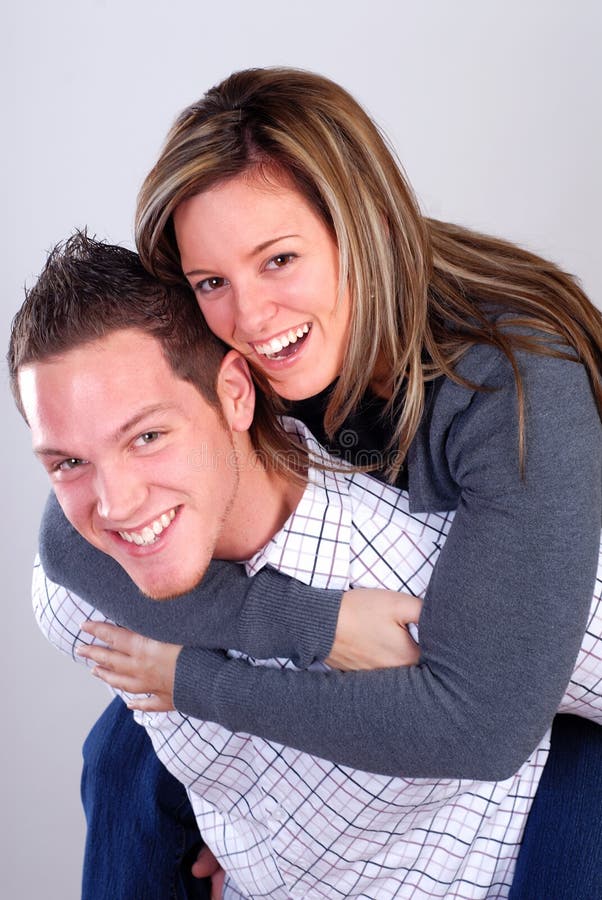 Piggyback Ride stock photo. Image of male, handsome, blond - 3864744