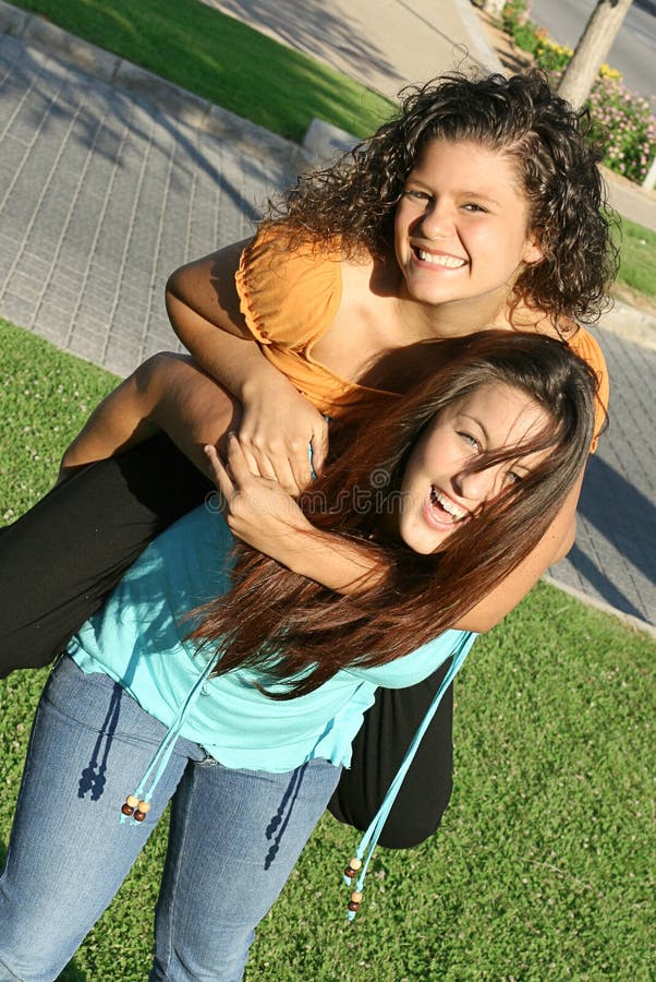 Piggyback teenagers stock image. Image of friendship, piggyback - 831075
