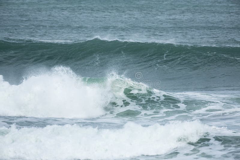 Piha Surf stock photo. Image of breaking, winter, auckland - 58105028