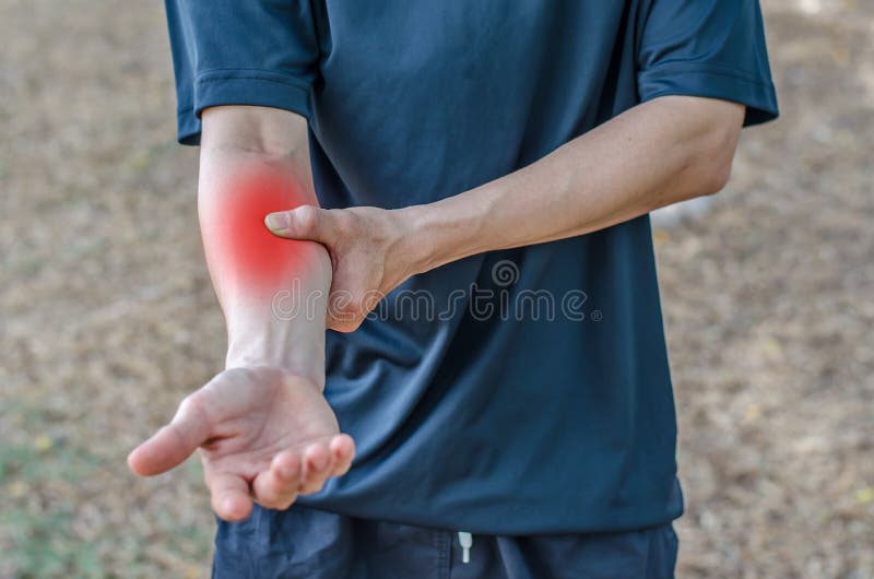 Mens Die Zijn Hand Houden Die - Pijn Aan Concept Lijden Stock Foto ...