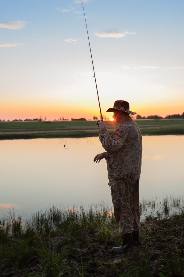 Pike hunter on the river stock image. Image of color - 97233317