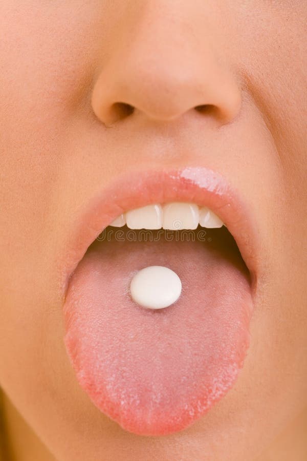 Pil op tong stock foto. Image of slik, studio, levensstijl - 7630510