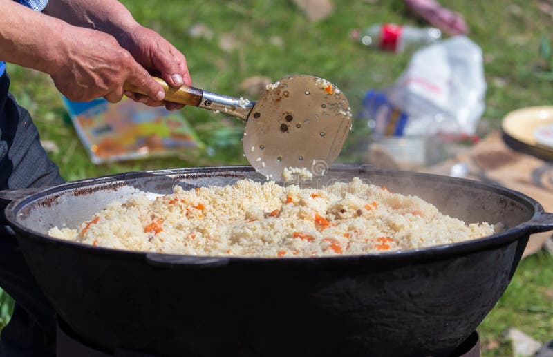 Pilaf Cooked in a Large Cauldron in Nature Stock Photo - Image of cook ...