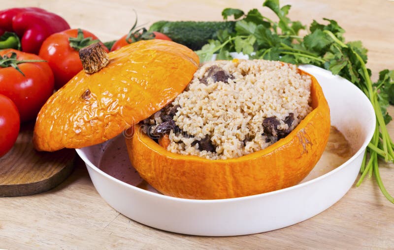 Pilaf in pumpkin stock image. Image of delicious, healthy - 179966335