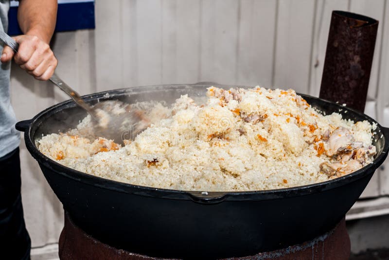 Pilaf, Rice with Meat with a Big Pot Stock Photo - Image of meat ...