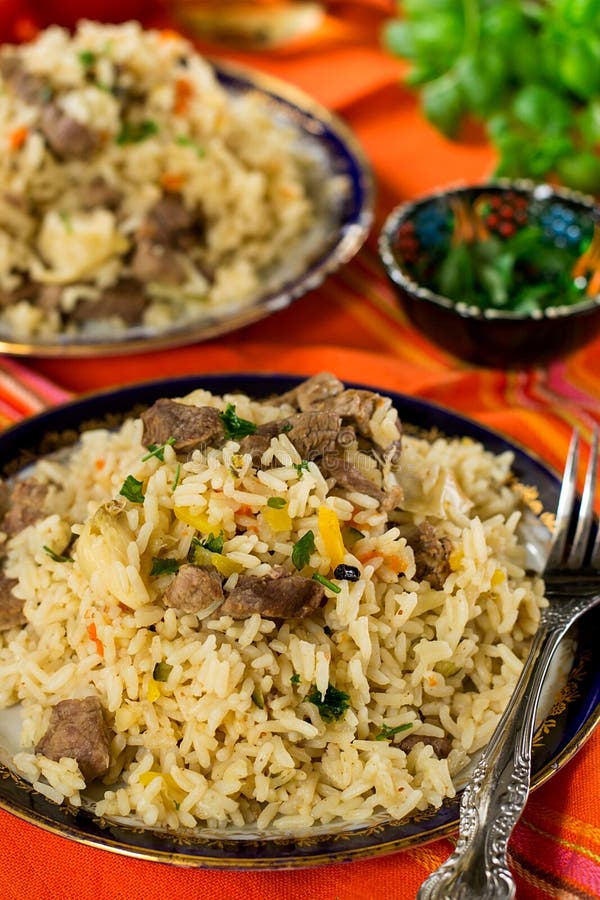 Pilaf Style Rice and Lamb with Carrots and Garlic Stock Photo - Image ...