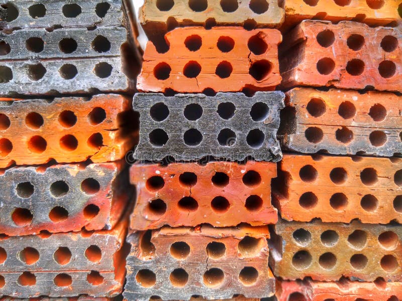 Ladrillos Perforados De Diversos Colores Y Formas De Agujeros Imagen de ...