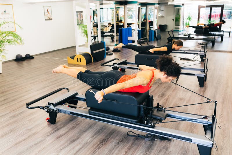 Pilates gym stock image. Image of beds, healthy, body - 64291369
