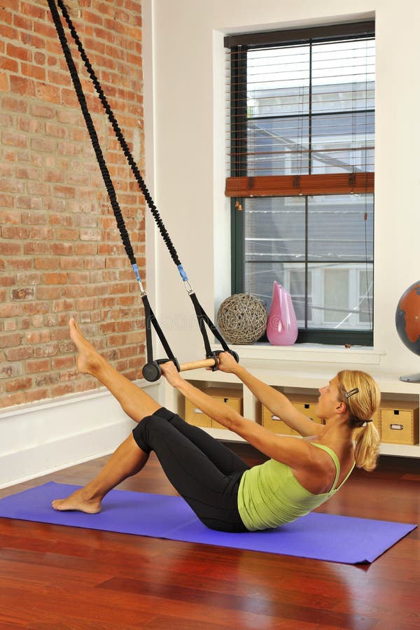 Stretch on Pilates Barrel stock image. Image of brunette - 15201849