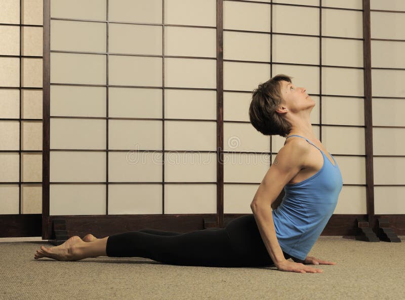 Stretch on Pilates Barrel stock photo. Image of training - 15201852