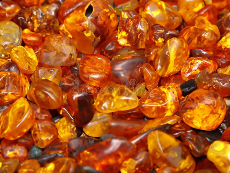 A Pile of Amber Stones with a Yellow Center Stock Photo - Image of ...