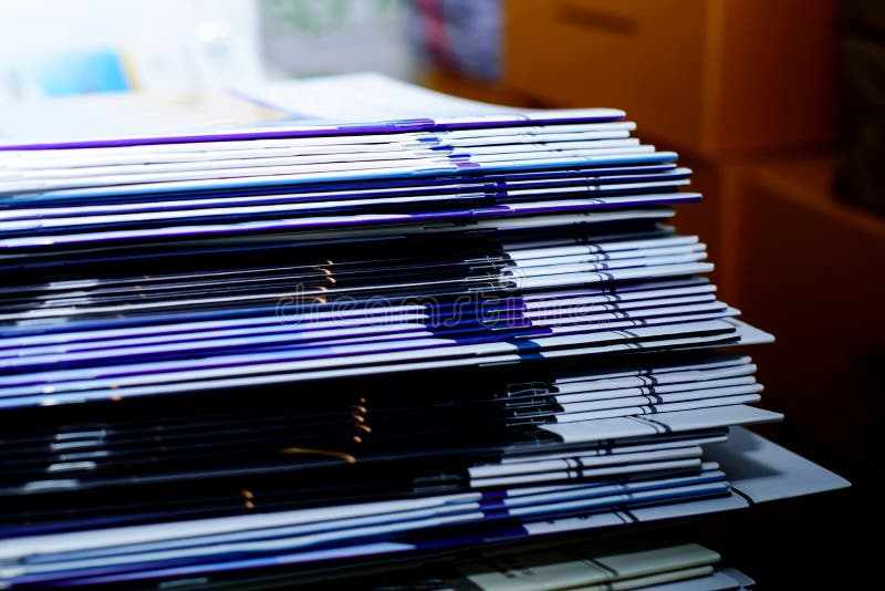 A Pile of Annual Report Books on the Floor in the University Library ...