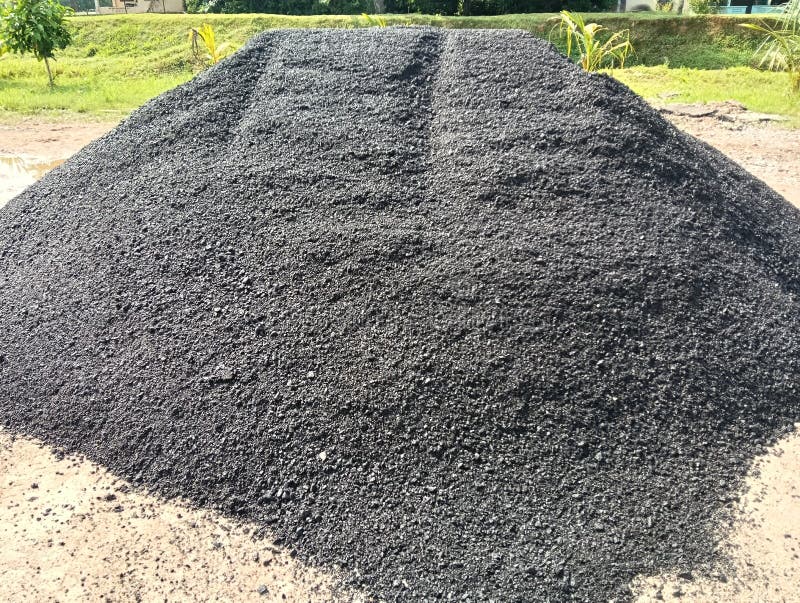 A Pile of Asphalt or Tar for Road Construction in a Rural Area Stock ...