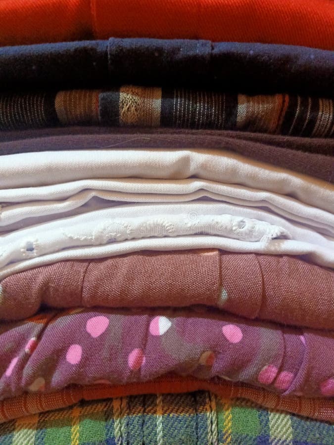 A Stack of Ironed and Folded Clothes Stock Photo - Image of cotton ...