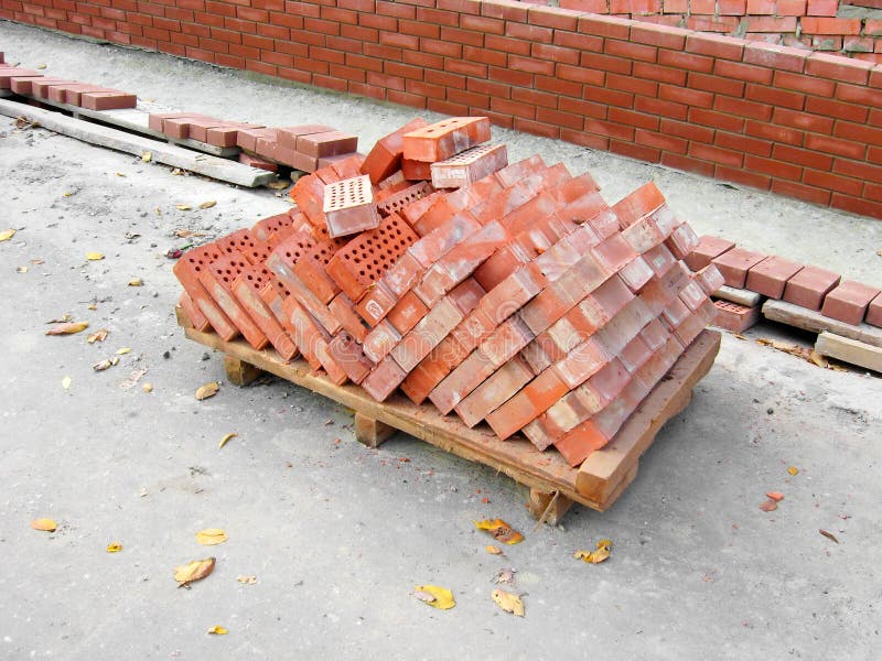 Pile of the baked bricks stock photo. Image of orange - 8506612