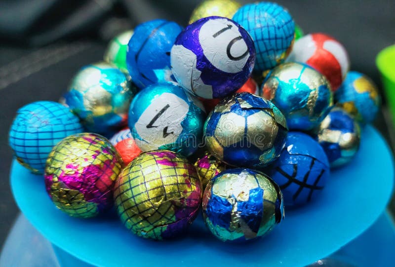 A Pile of Ball-shaped Chocolate Candies of Different Colors on a Bowl ...