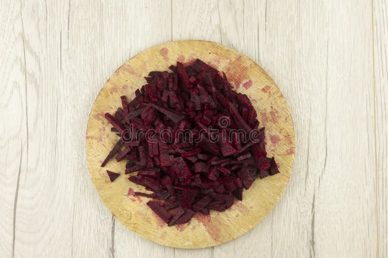 Pile of Beetroot Strips on Wooden Cutting Board - Close Up Stock Photo ...