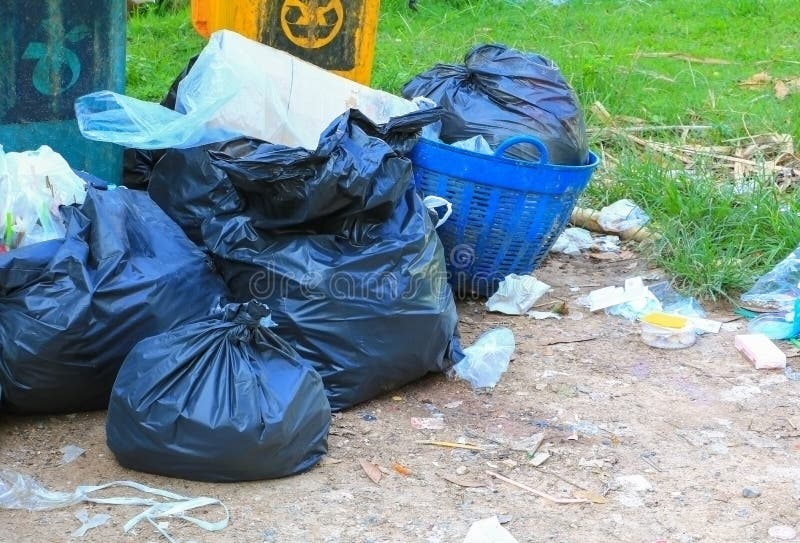 Pile Black Garbage Bag and Bucket Roadside in the City Stock Photo ...