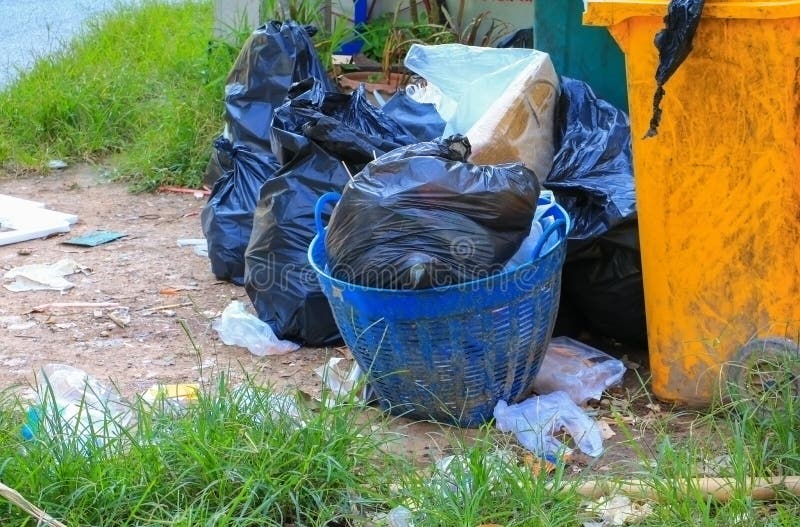 Pile Black Garbage Bag and Bucket Roadside in the City Stock Image ...
