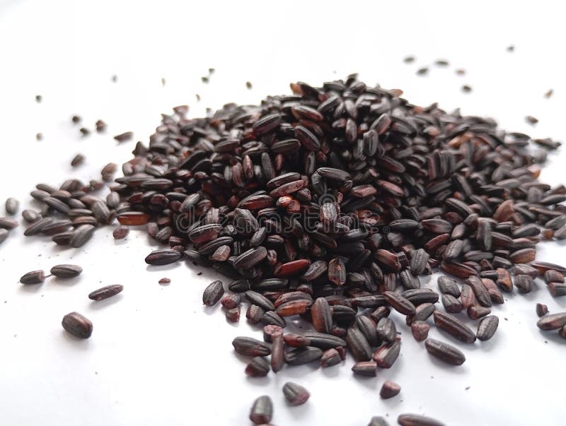 A Pile of Black Rice on a White Kitchen Board Stock Image - Image of ...