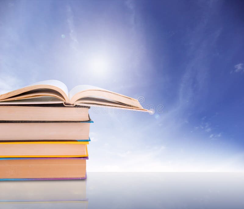 Books on the grass stock photo. Image of printed, close - 5159842