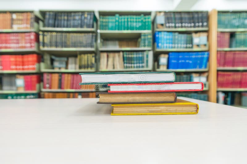 A Pile of Books with Library on the Back Stock Photo - Image of library ...