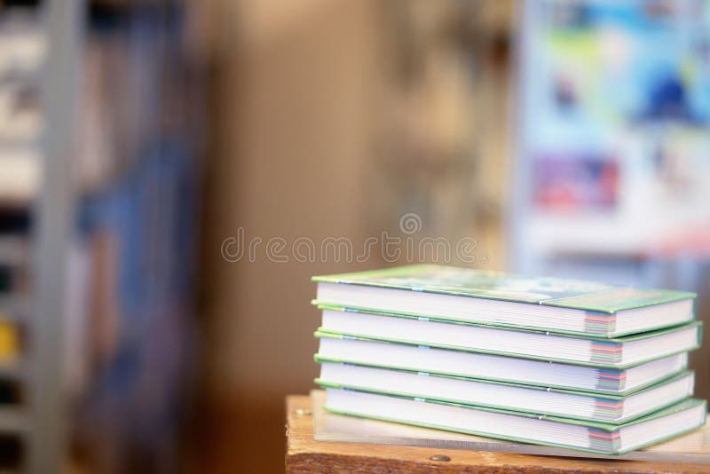 A Pile of Books with Library on the Back Stock Photo - Image of ...
