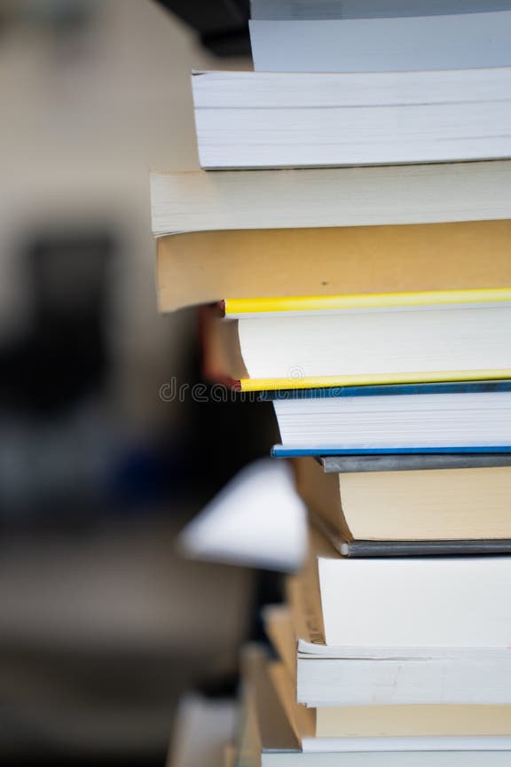Stack of Books in a Library To Read Stock Photo - Image of reading ...