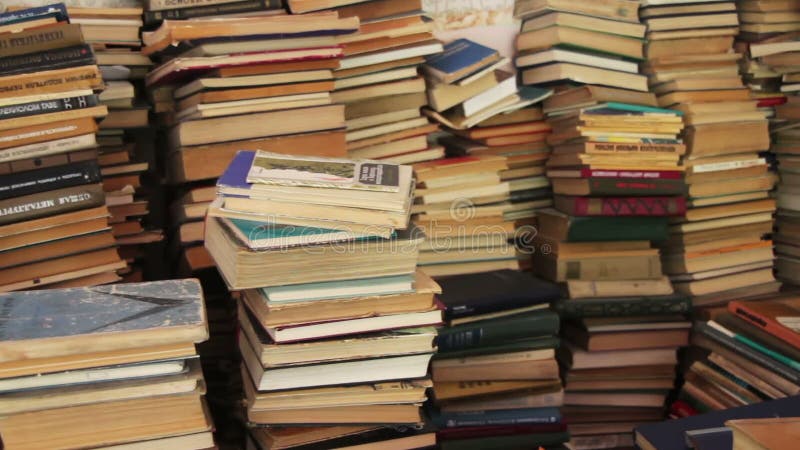 Pile of Books Scattered on the Floor in the Library Stock Footage ...