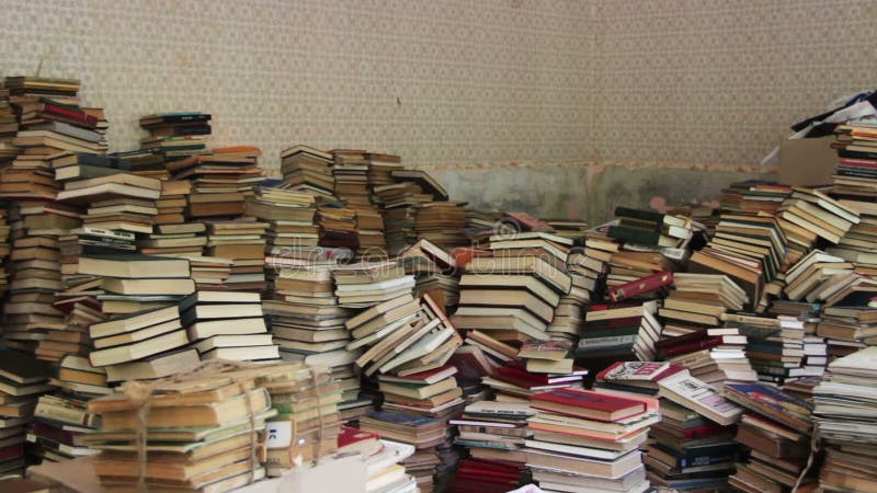Pile of Books Scattered on the Floor in the Library Stock Footage ...