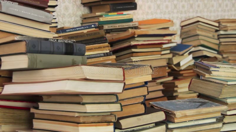 Pile of Books Scattered on the Floor in the Library Stock Video - Video ...