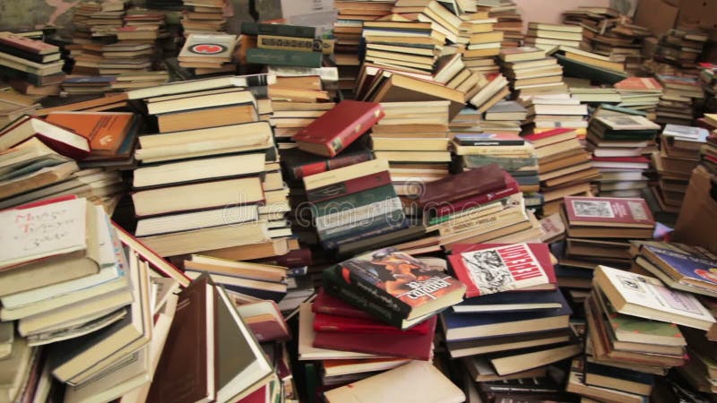 Pile of Books Scattered on the Floor in the Library Stock Video - Video ...