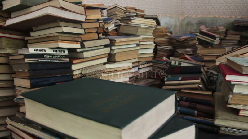Pile of Books Scattered on the Floor in the Library Stock Footage ...