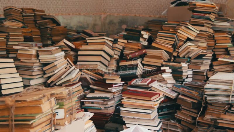 Pile of Books Scattered on the Floor in the Library Stock Video - Video ...
