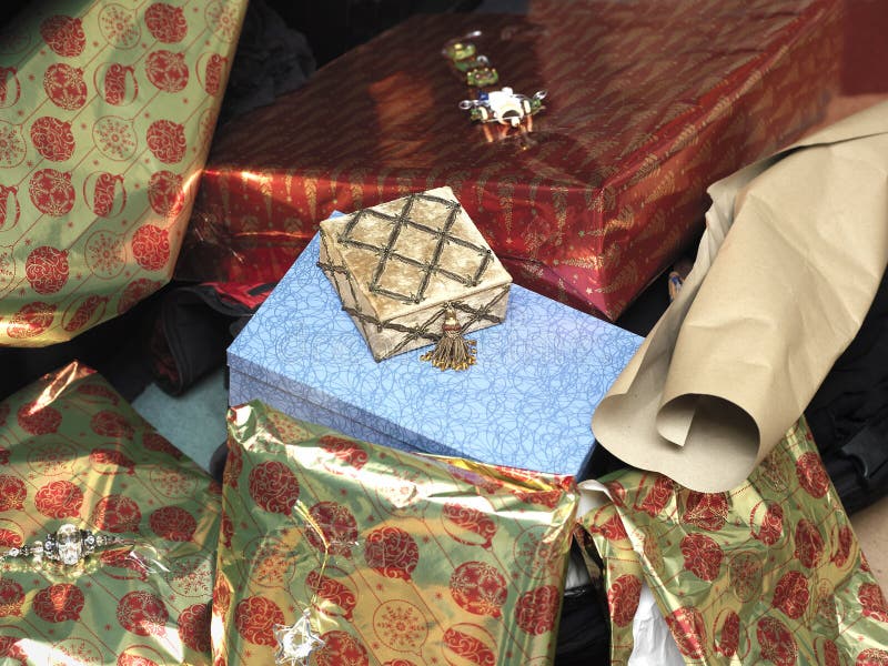 Presents and Wrapping Paper Stock Photo - Image of messy, wrapped ...