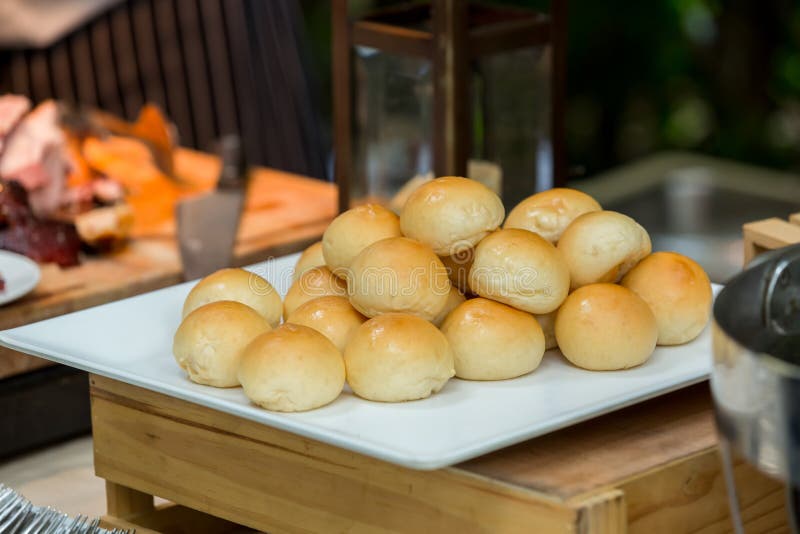 Pile bread buns in plate. stock photo. Image of bread - 236668702