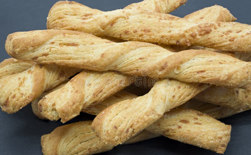 A Pile of Bread Cheese Flavoured Sticks Piled on Top of Each Other ...