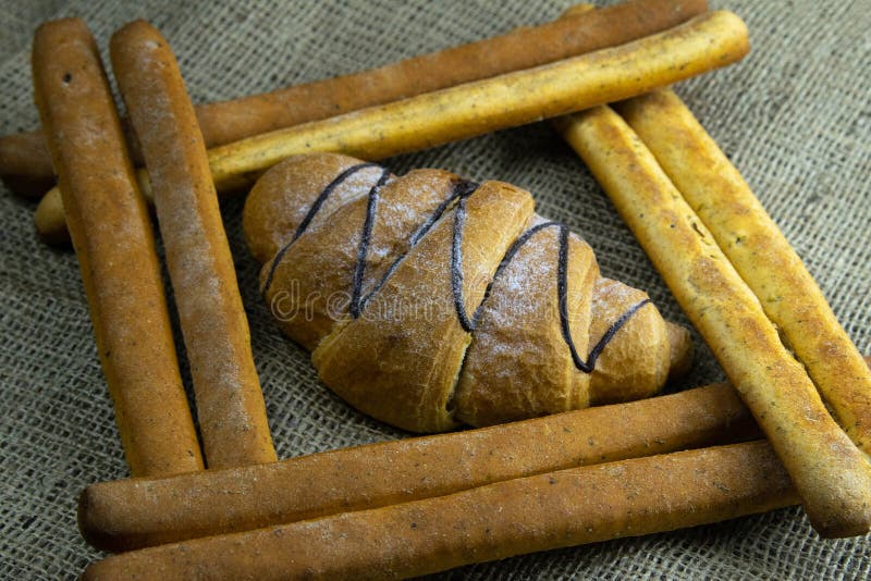 A Pile of Bread Sticks or Grissini in the Shape of a Square Inside a ...