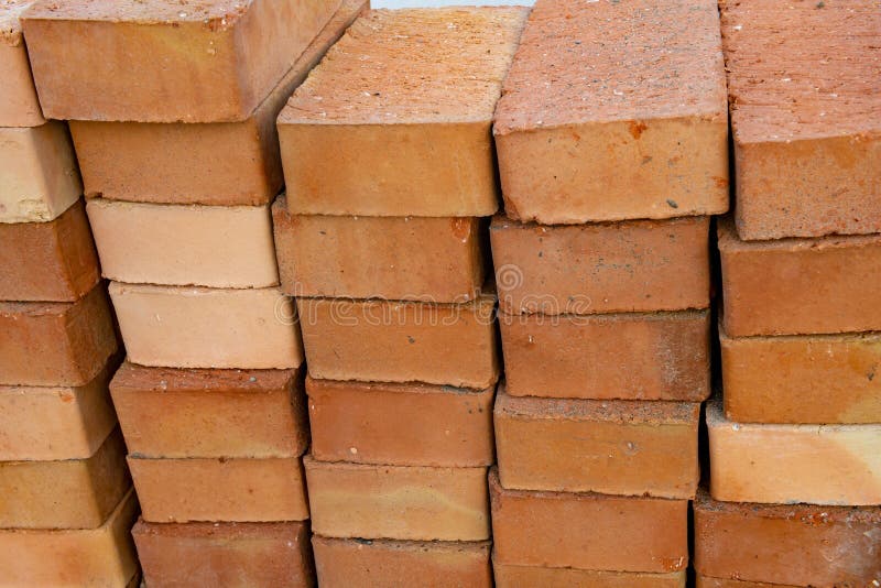 Pile of Bricks on Construction Site, Modern Construction Uses Bricks in ...