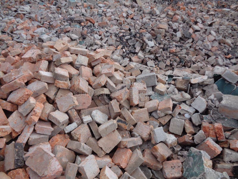 A pile of broken bricks stock image. Image of construction - 138754135