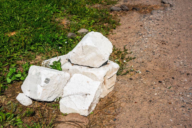 A Pile of Broken White Bricks on the Ground Stock Image - Image of ...