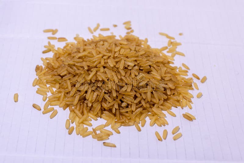 Pile of Brown Rice Uncooked Isolated on White Background Stock Photo ...