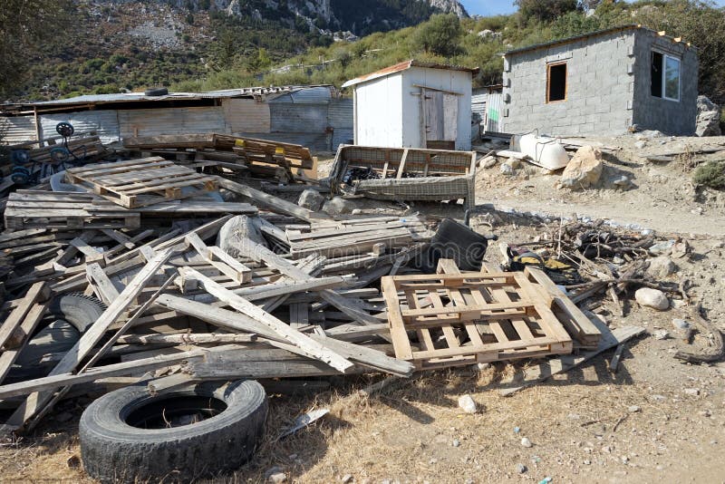 A Pile of Building Materials Near the Warehouse Stock Image - Image of ...