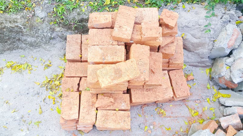 A Pile of Building Materials, Stack of New Red Bricks for Construction ...